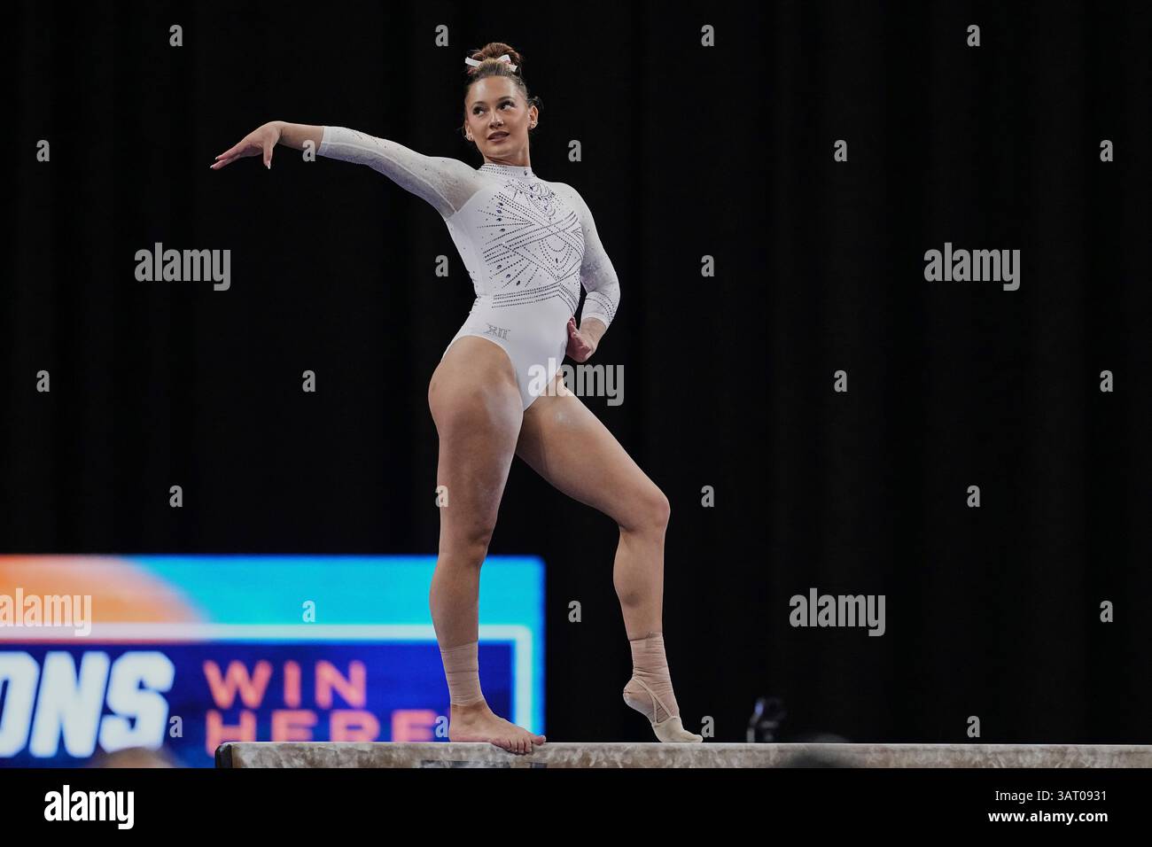 Utah's Makenna Smith competes on the balance beam during the NCAA women ...