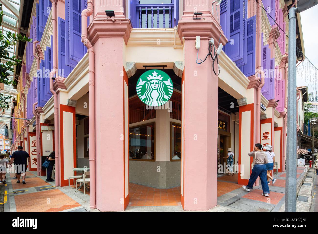 Visitors visit two storey shophouses Starbucks business outlet, a high ...