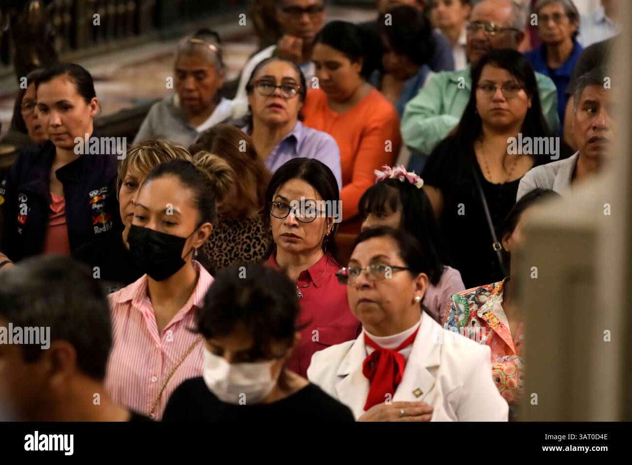 Catholic faithful attend the mass of the Washing of the Feet on Holy ...