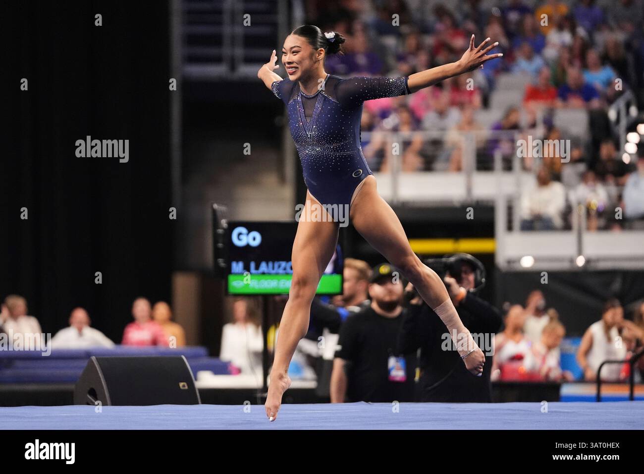 California's Mya Lauzon competes on the floor exercise during the NCAA ...