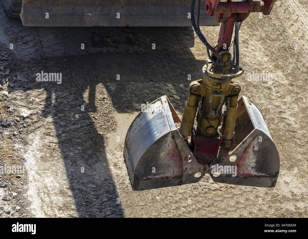 Excavator grab on the construction site Stock Photo - Alamy