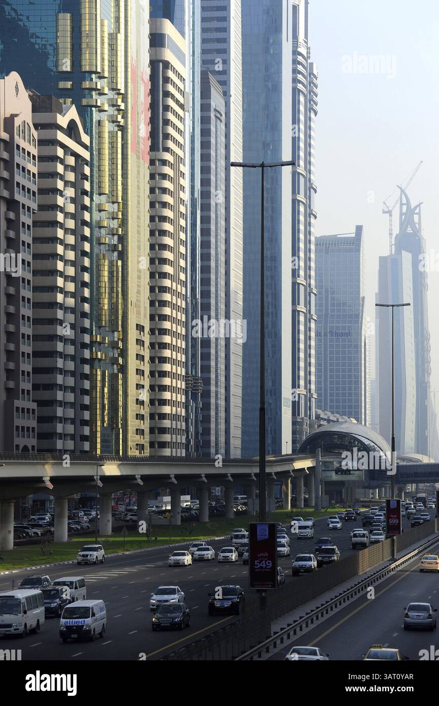 Skyscraper on Sheikh Zayed Road between Emirates Towers and Financial ...