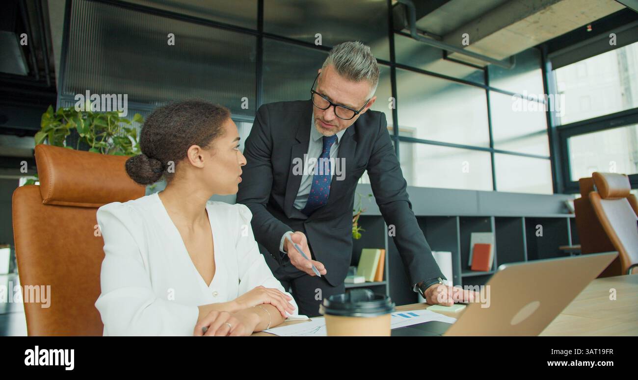 Reviewing data two professionals hi-res stock photography and images - Alamy