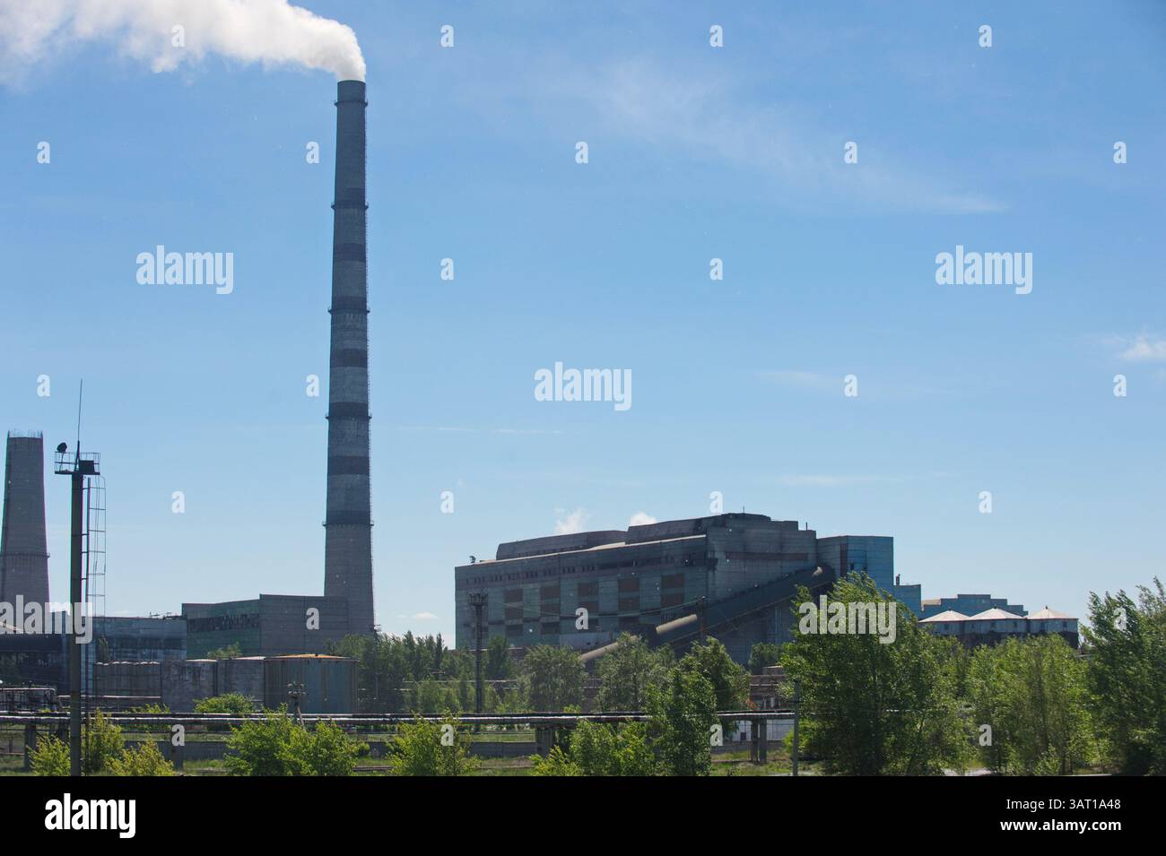 Pipes and generating stations of a large thermal power plant Stock ...
