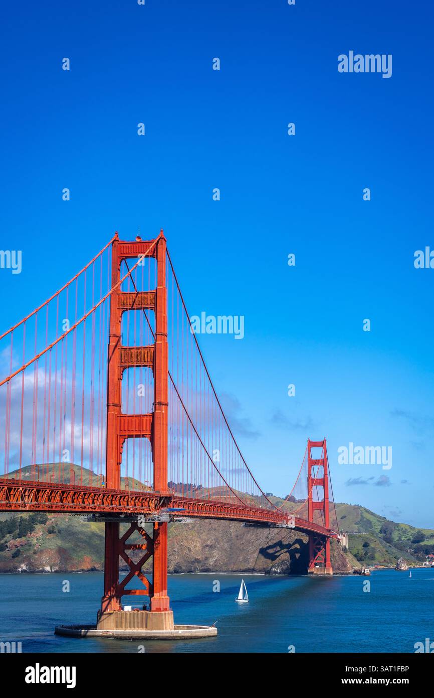 The Golden Gate Bridge Stretches Across The Bay Its Red Towers