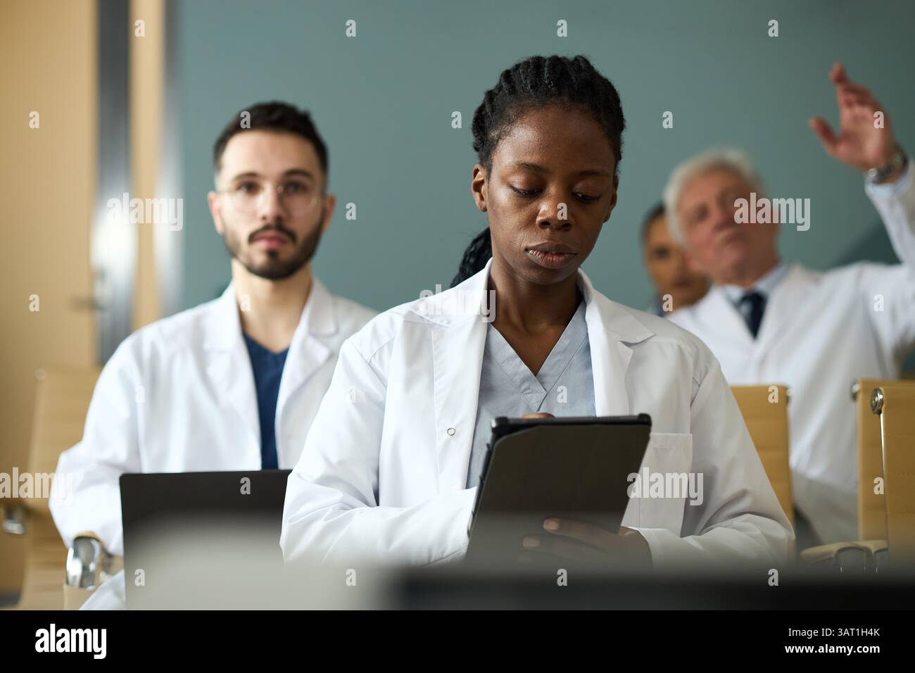 Collaborating digital data diverse group hi-res stock photography and ...