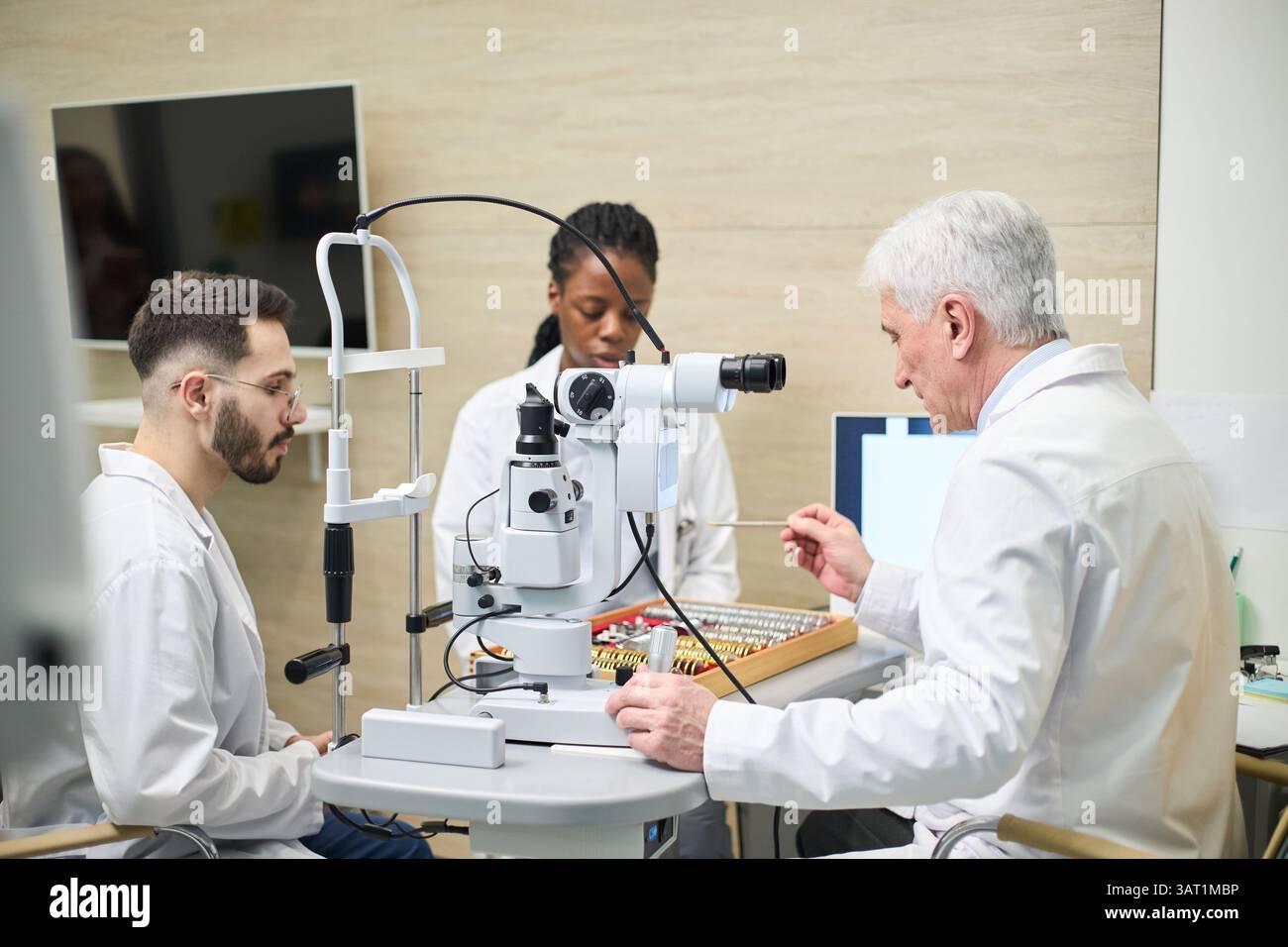Conducting Eye Examination in Modern Medical Facility Stock Photo - Alamy