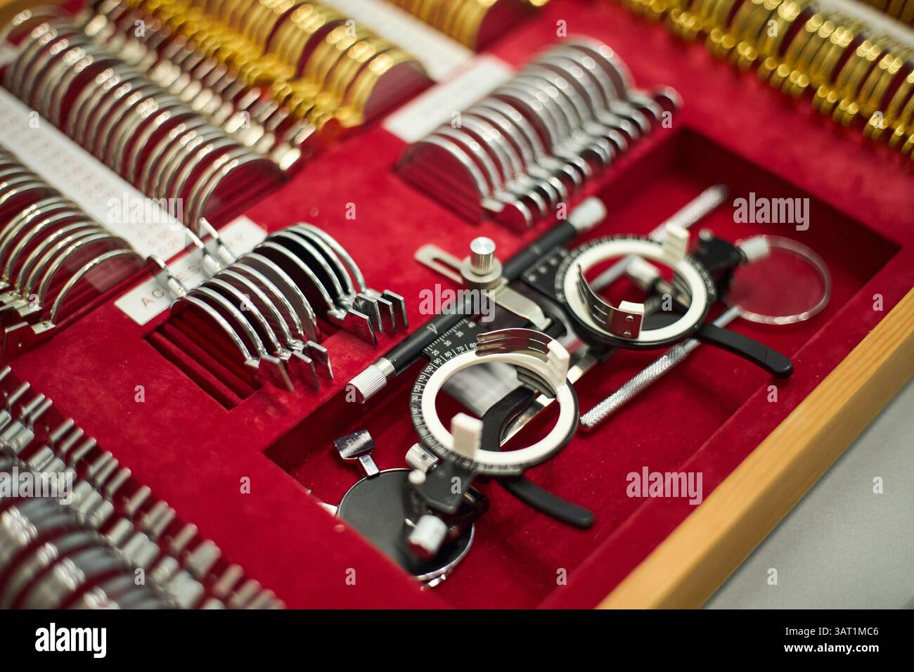 Displaying Various Ophthalmology Testing Lenses in Red Case Stock Photo ...