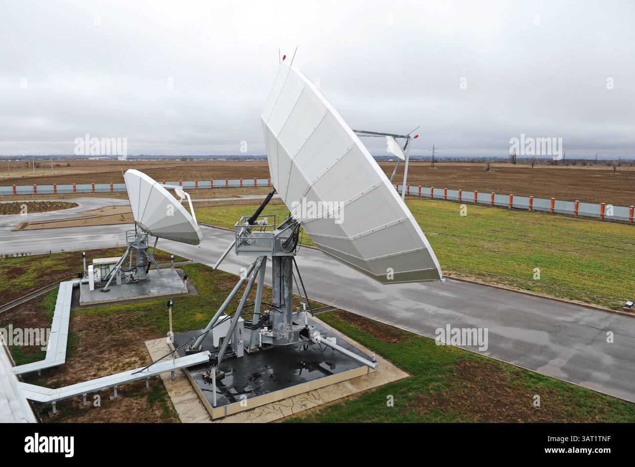 Parabolic industrial antennas and the territory of the KAZSAT satellite ...