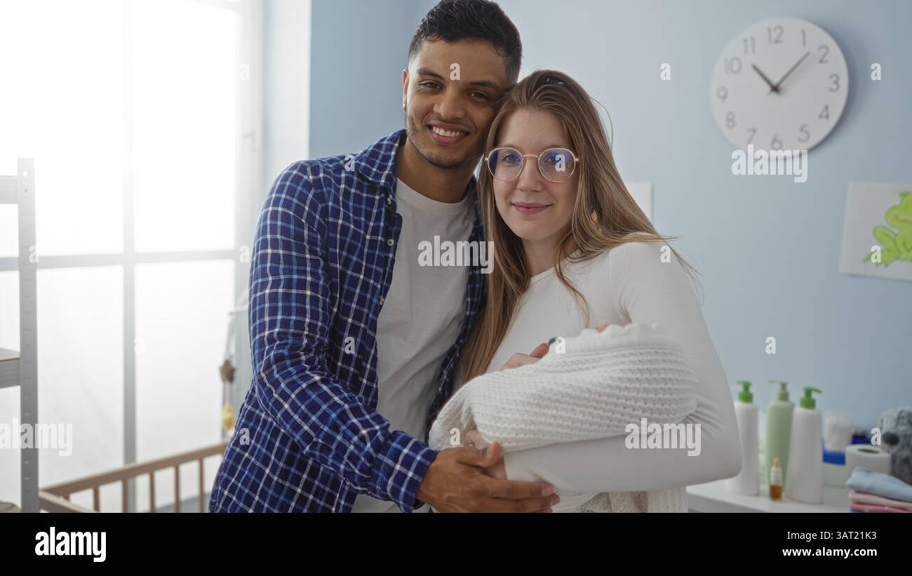 Woman lovingly holding baby hi-res stock photography and images - Alamy