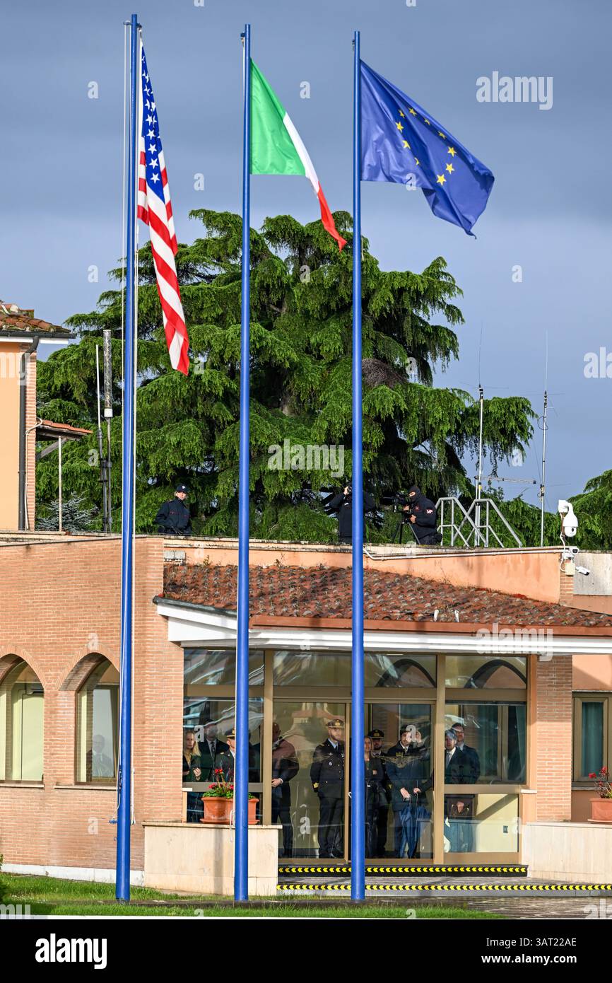 Italian government officials look on as Vice President JD Vance and ...