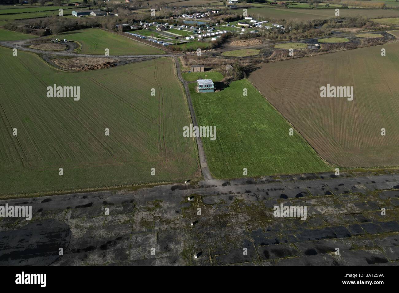 aerial view of RAF Wombleton control tower and main runway WW2 military ...