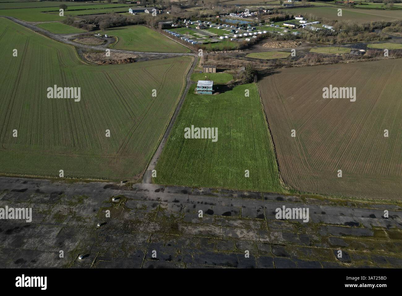 aerial view of RAF Wombleton control tower and main runway WW2 military ...
