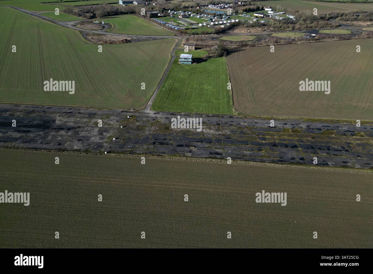 aerial view of RAF Wombleton control tower and main runway WW2 military ...