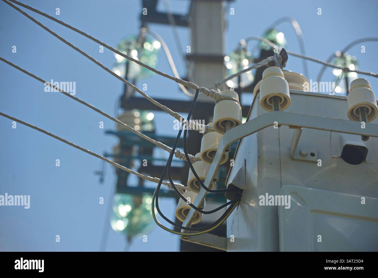 High-voltage power lines with insulators, stabilizers and transformers ...