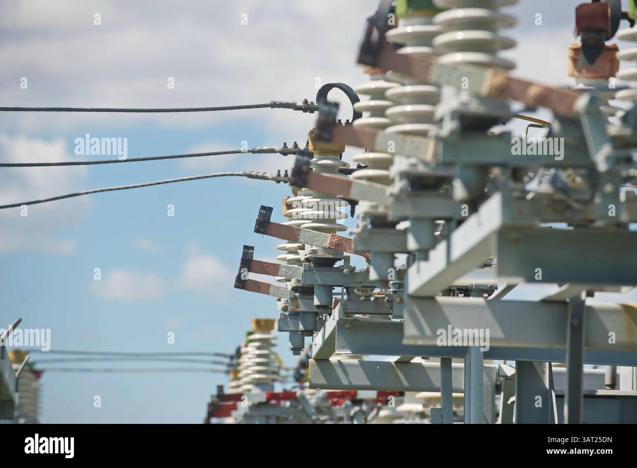 High-voltage power lines with insulators, stabilizers and transformers ...