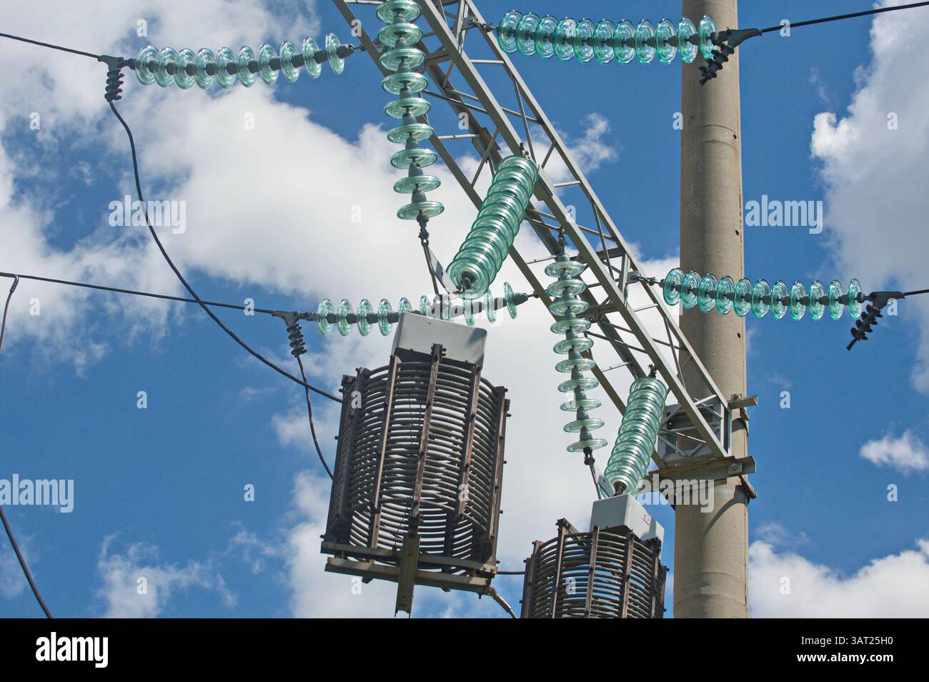 High-voltage power lines with insulators, stabilizers and transformers ...