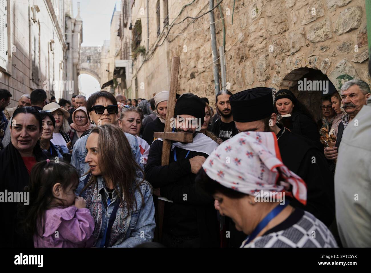 Christian pilgrims carry crosses during Good Friday procession in the ...