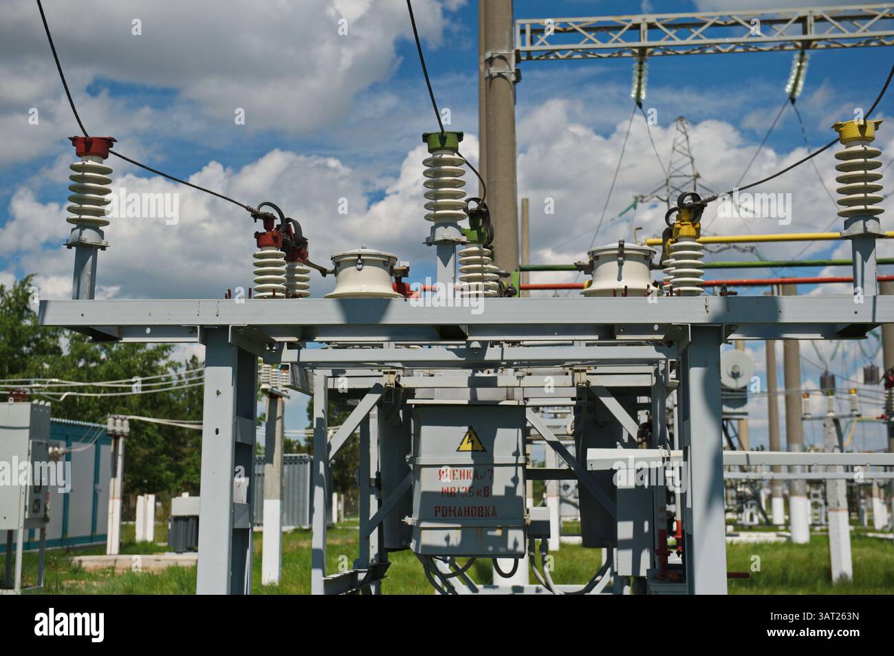 High-voltage power lines with insulators, stabilizers and transformers ...