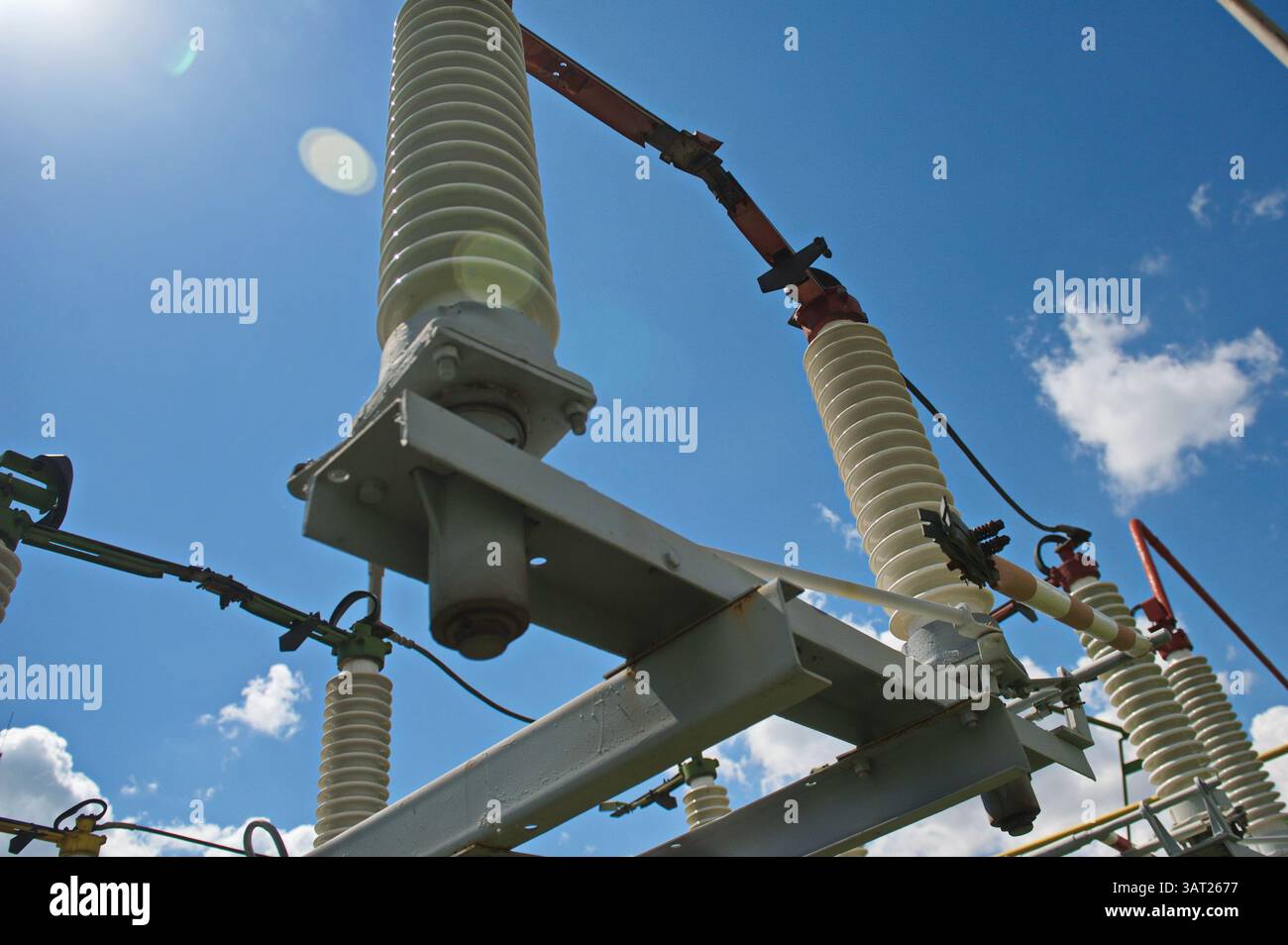 High-voltage power lines with insulators, stabilizers and transformers ...