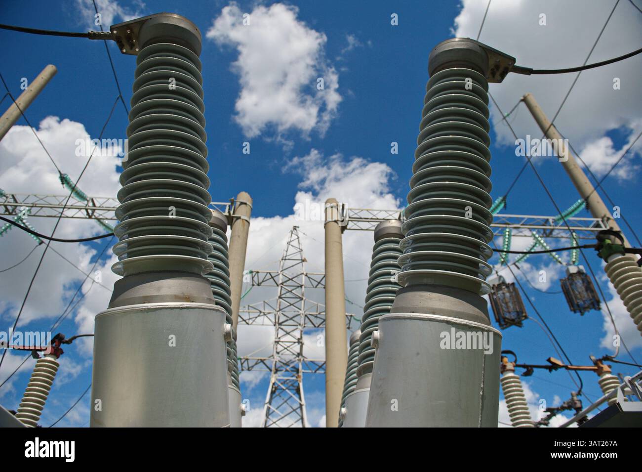 High-voltage power lines with insulators, stabilizers and transformers ...
