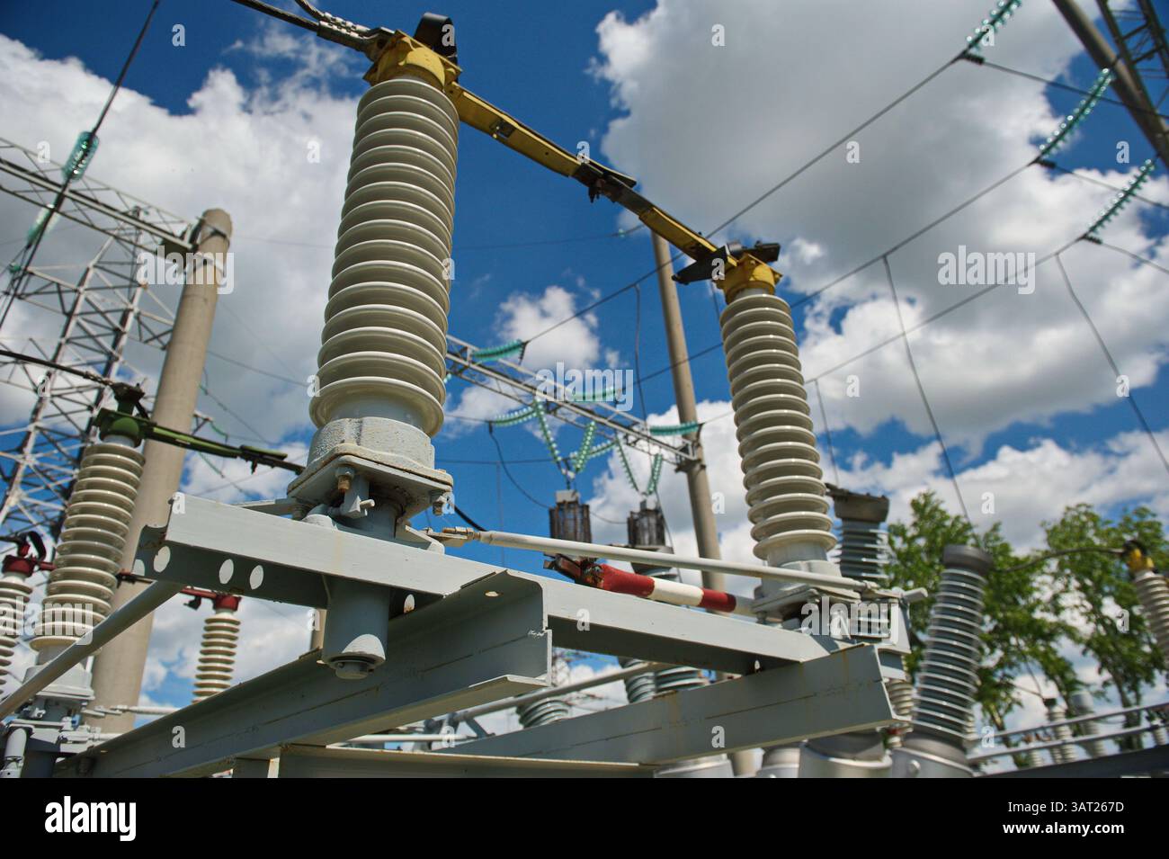 High-voltage power lines with insulators, stabilizers and transformers ...