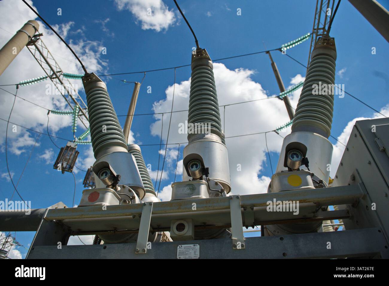 High-voltage power lines with insulators, stabilizers and transformers ...