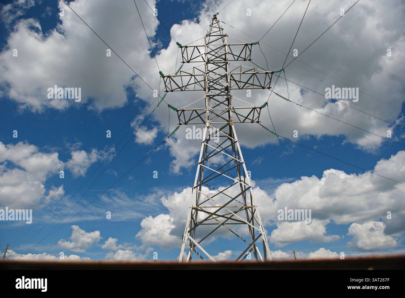 High-voltage power lines with insulators, stabilizers and transformers ...