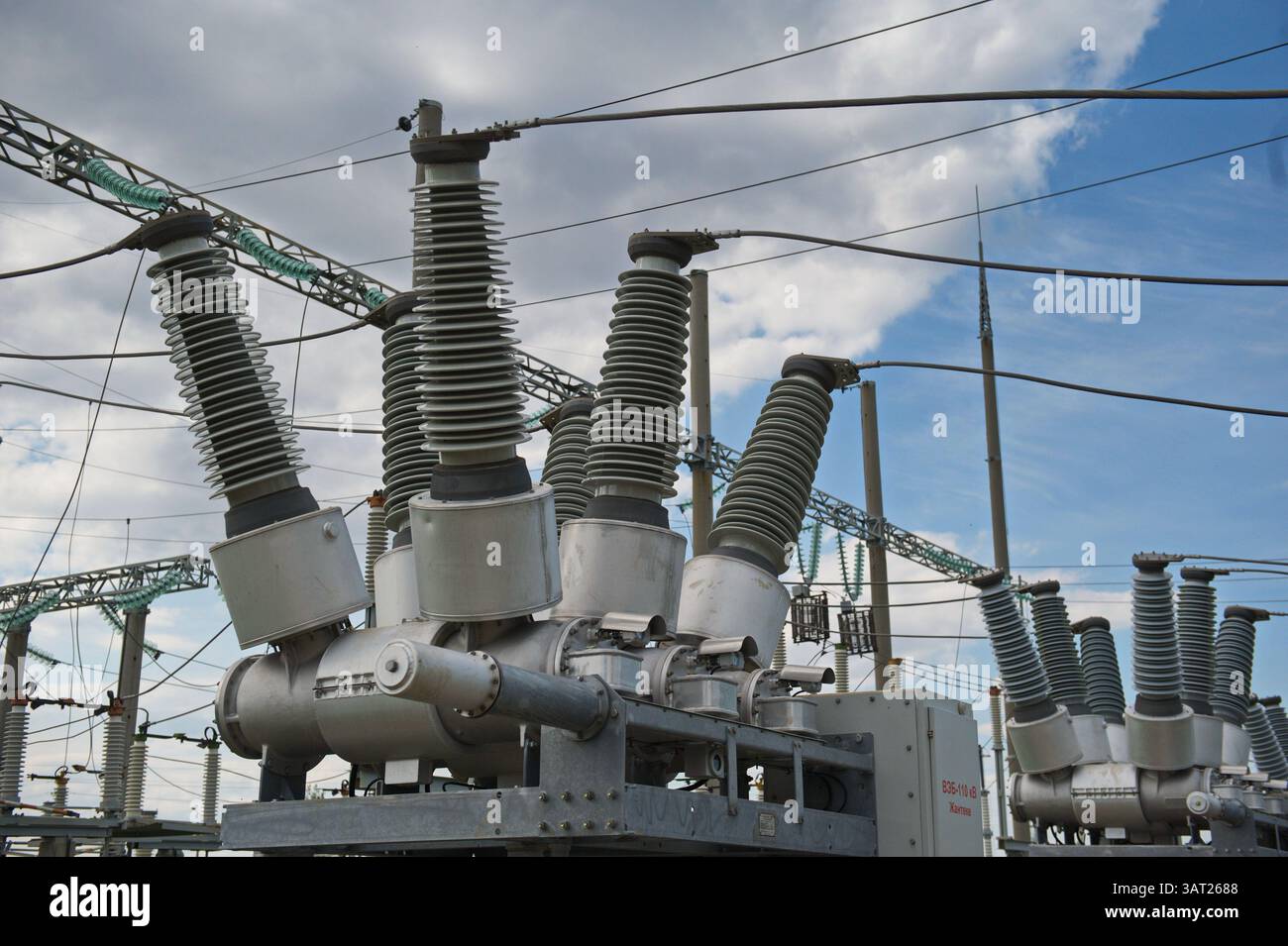 High-voltage power lines with insulators, stabilizers and transformers ...