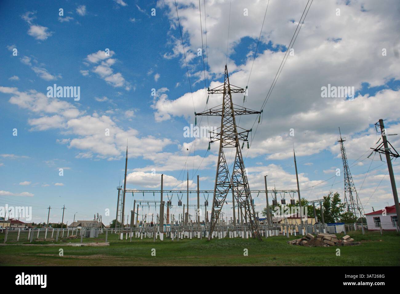 High-voltage power lines with insulators, stabilizers and transformers ...