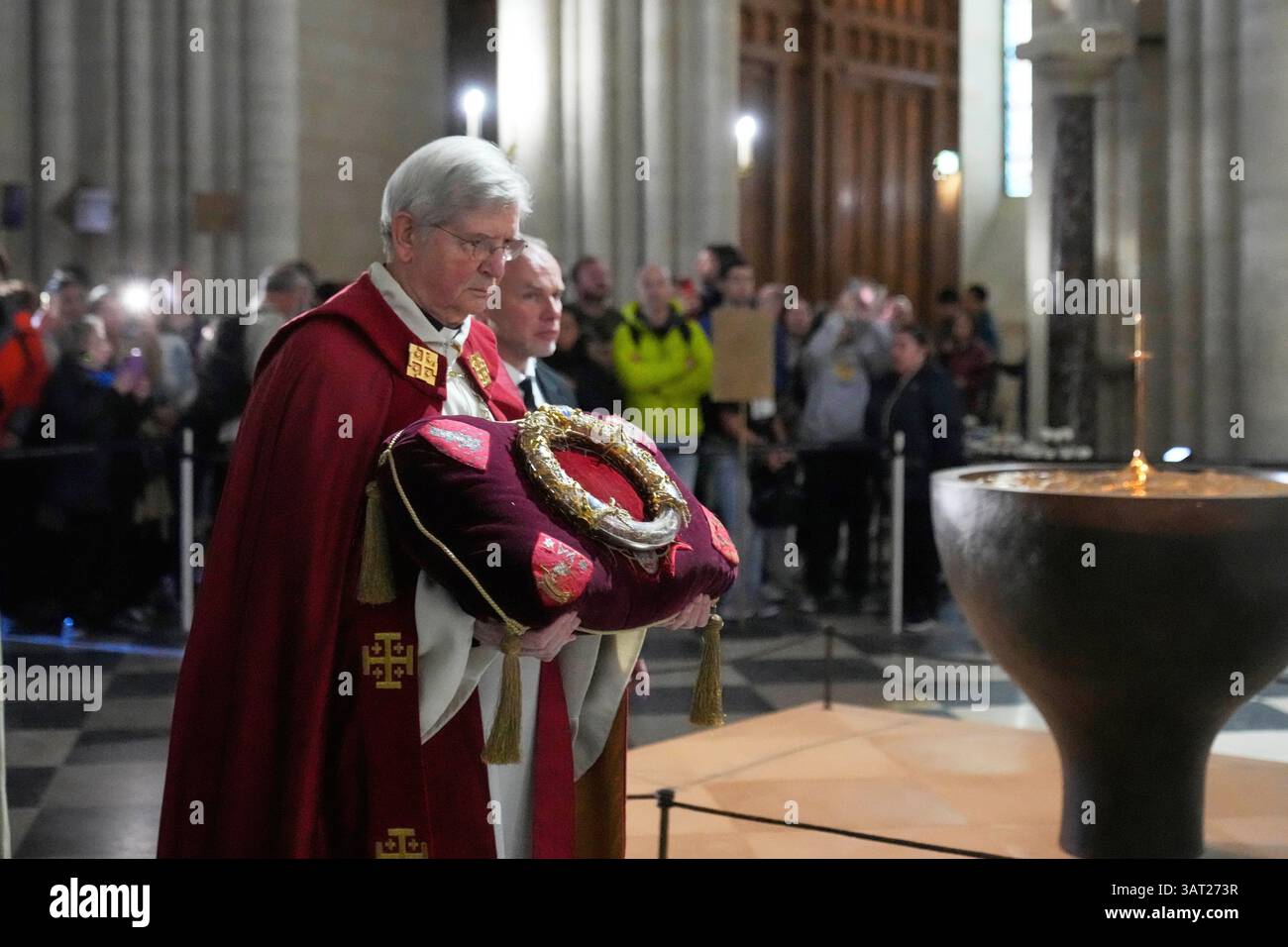 Paris Archbishop Laurent Ulrich holds the ancient relic that many ...