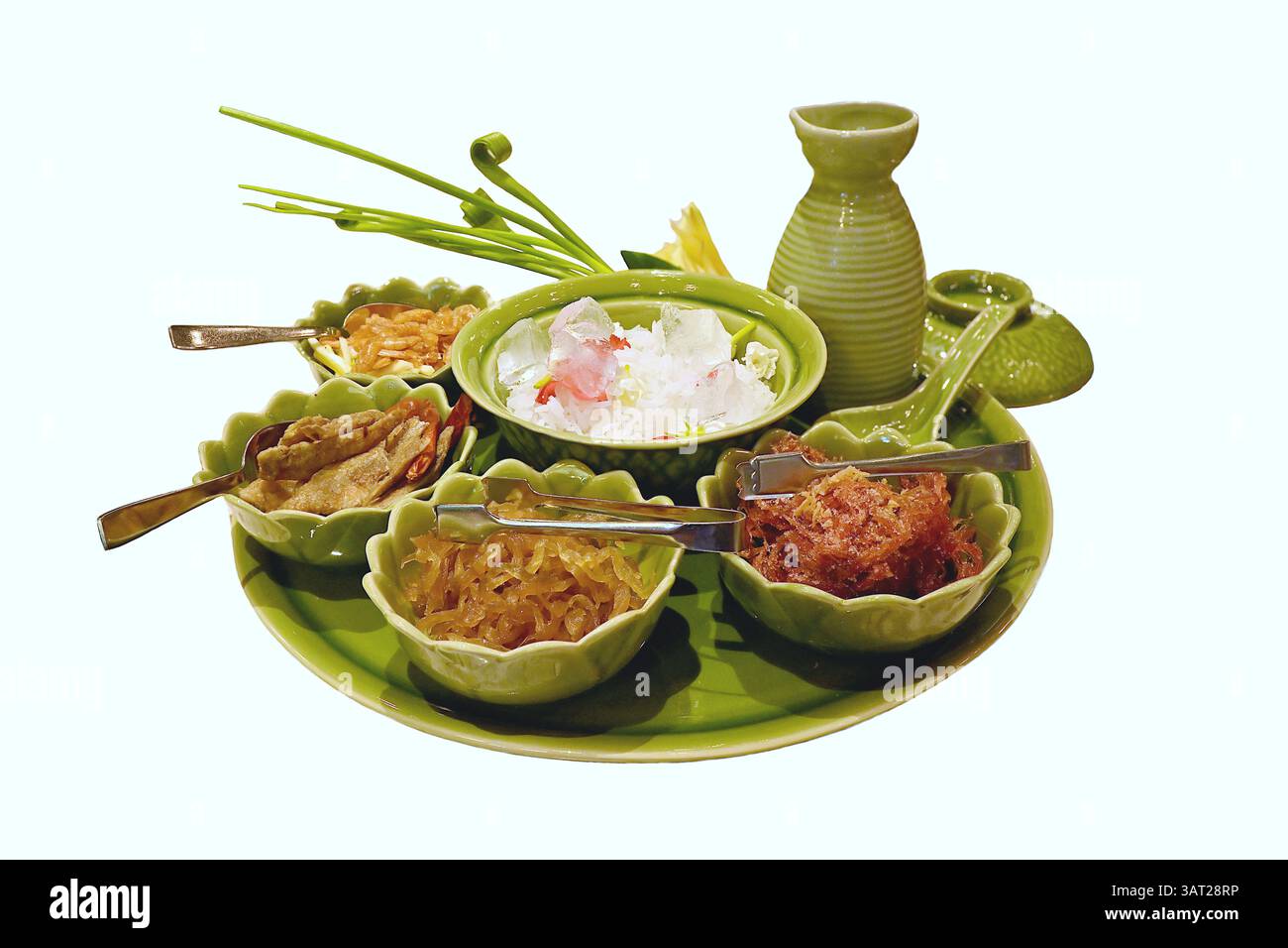 A Thai Khao Chae rice platter served with ice and fragrant flower ...