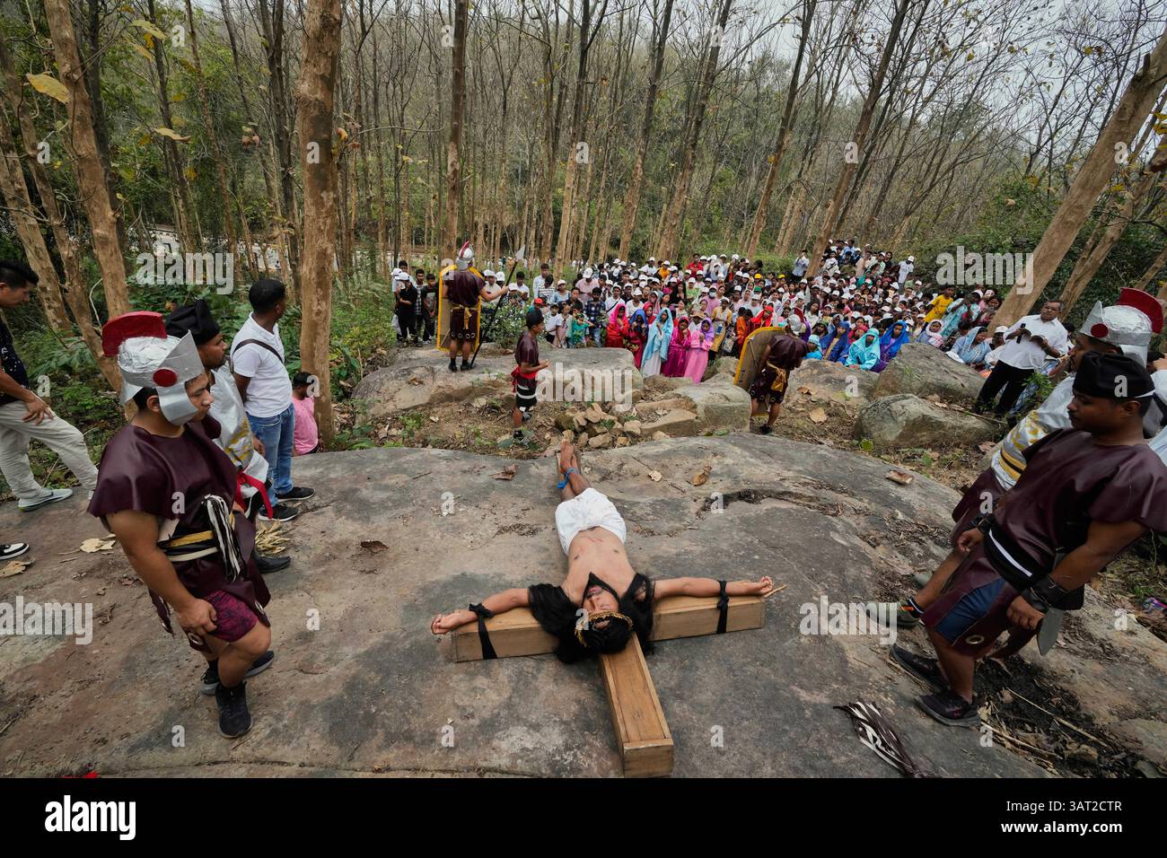 Christians reenact the crucifixion of Jesus Christ to mark Good Friday in Guwahati, India ...