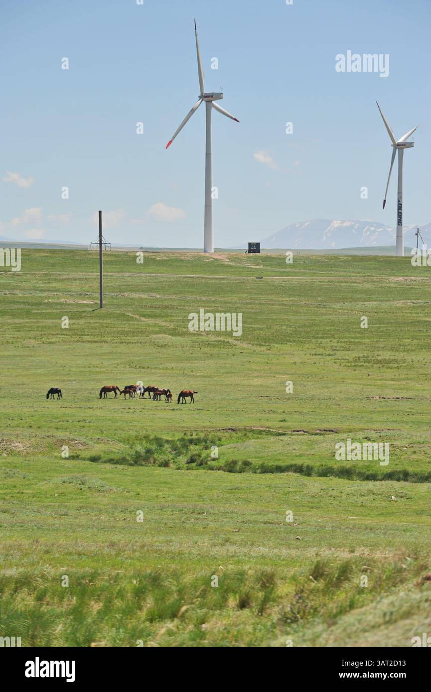 Wind turbines located in an open hilly area to collect energy Stock ...