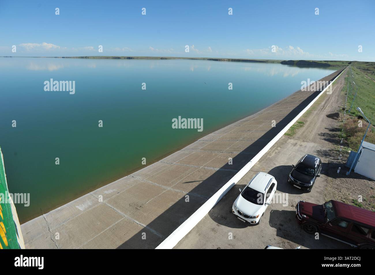 Dam water discharge bay on the background of the main building of the ...