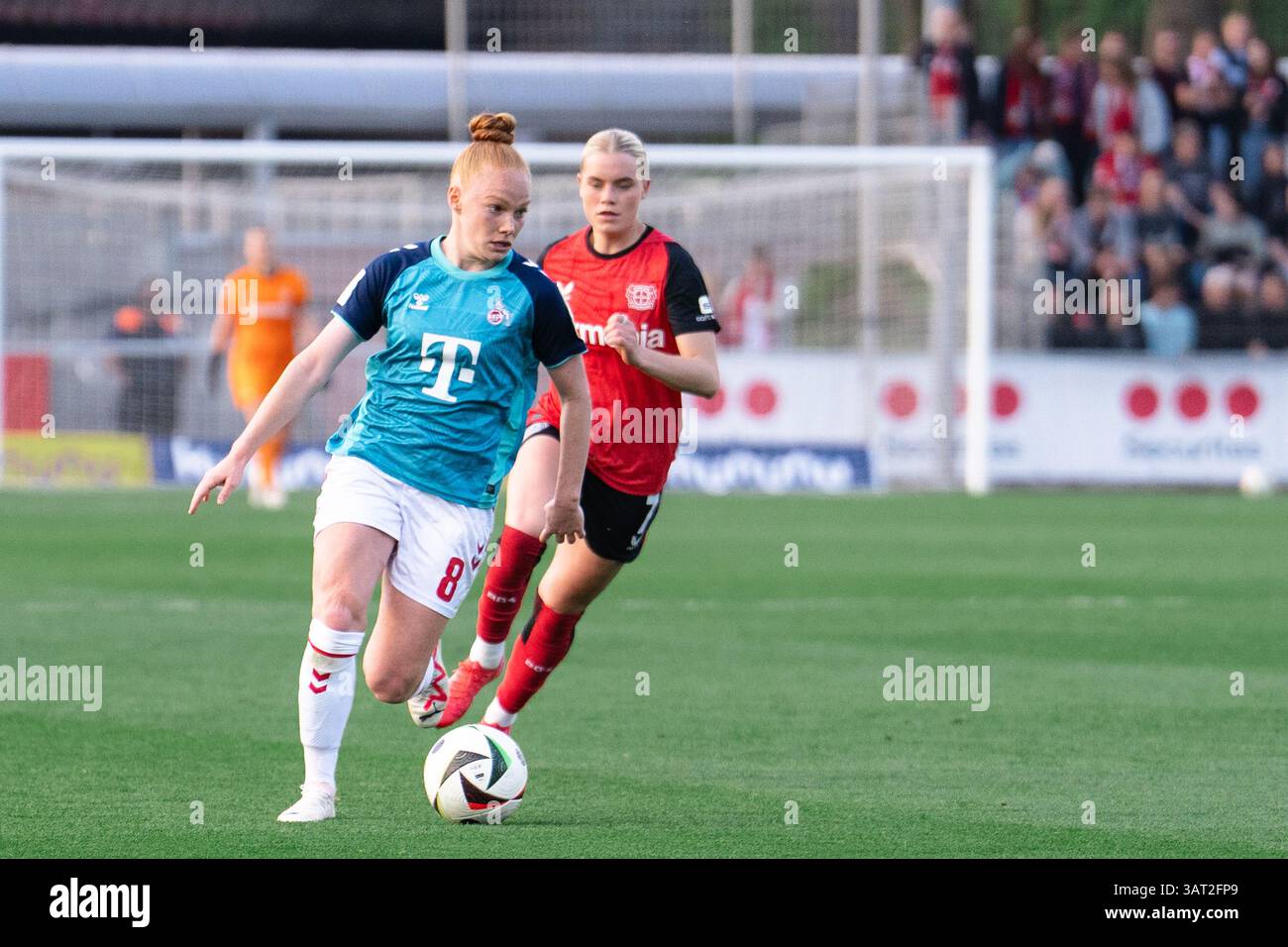 Leverkusen, Germany 14th April 2025: Laura Vogt (FC Köln, 8) and ...