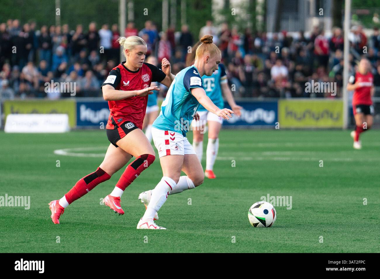 Leverkusen, Germany. 14th Apr, 2025. Laura Vogt (FC Köln, 8) and ...