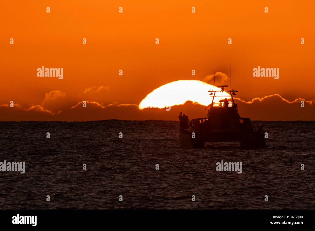 Tourist Catamaran Watching Hawaii Sunset Stock Photo - Alamy