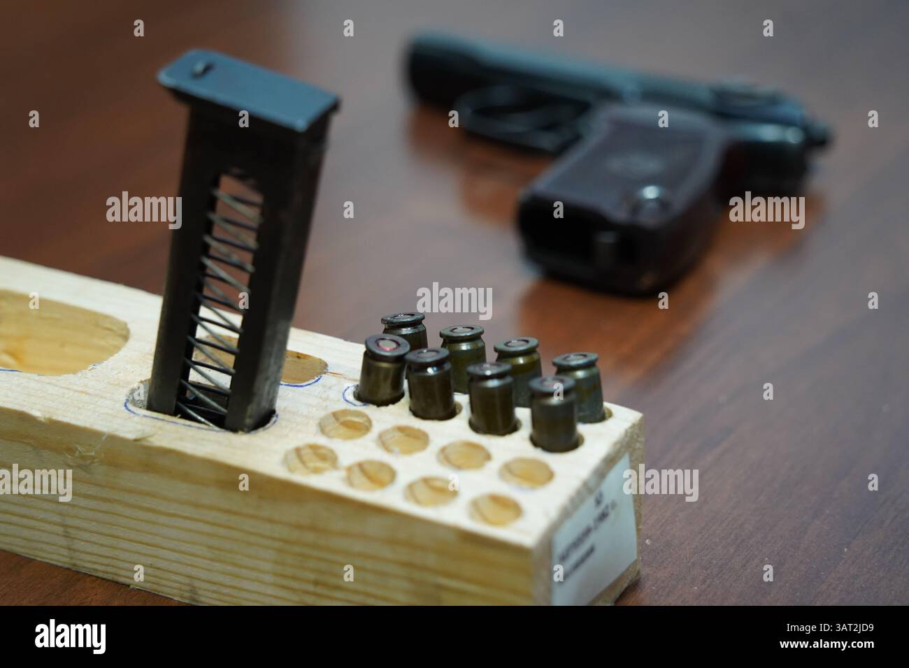 A police officer demonstrates a service weapon Stock Photo - Alamy