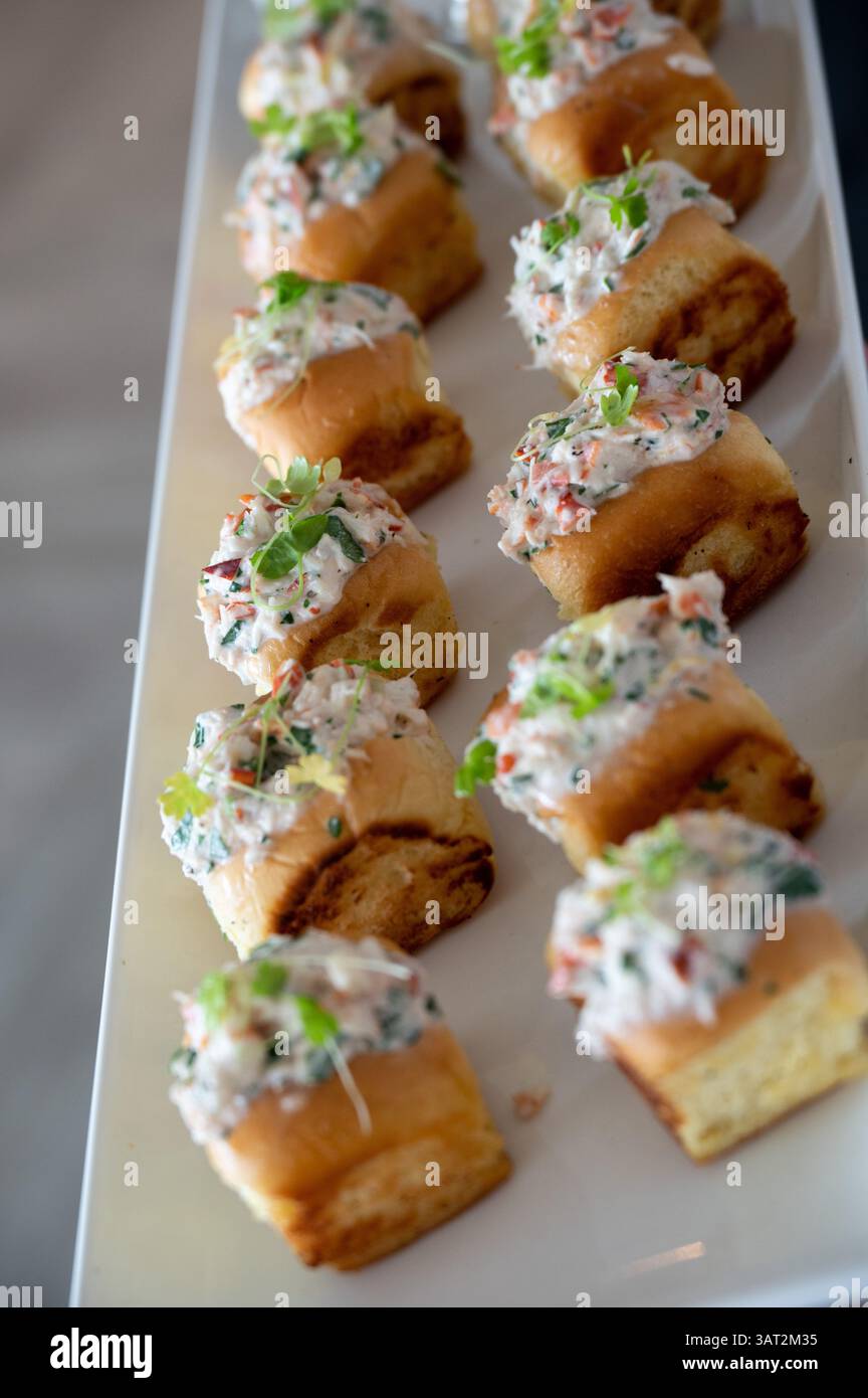 Mini Lobster Rolls with Fresh Herbs at Coastal Wedding Reception Stock ...