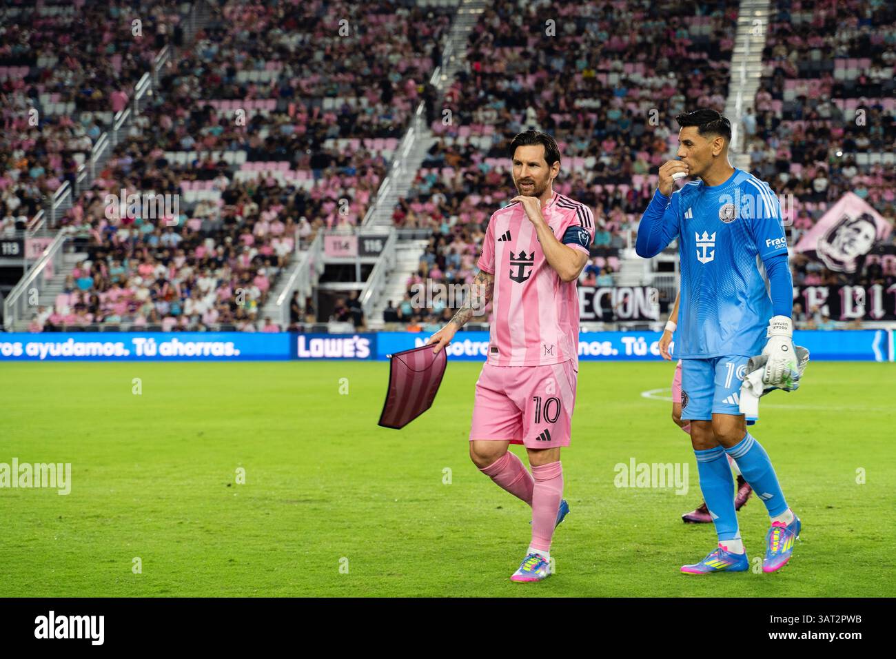April 9th 2025. Inter Miami CF captain Lionel Messi (10) talks to Oscar ...