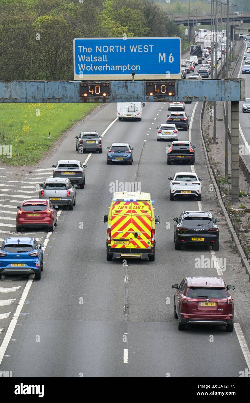 Great Barr, Birmingham, April 18th 2025. Drivers move out of the way for an ambulance on the M5 ...