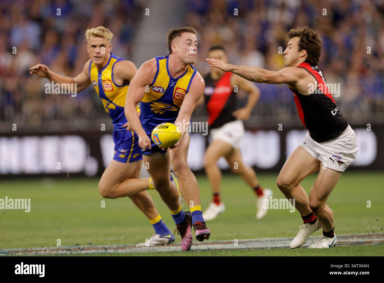 Perth, Australia. 18th Apr, 2025. Matthew Owies of the Eagles handballs ...