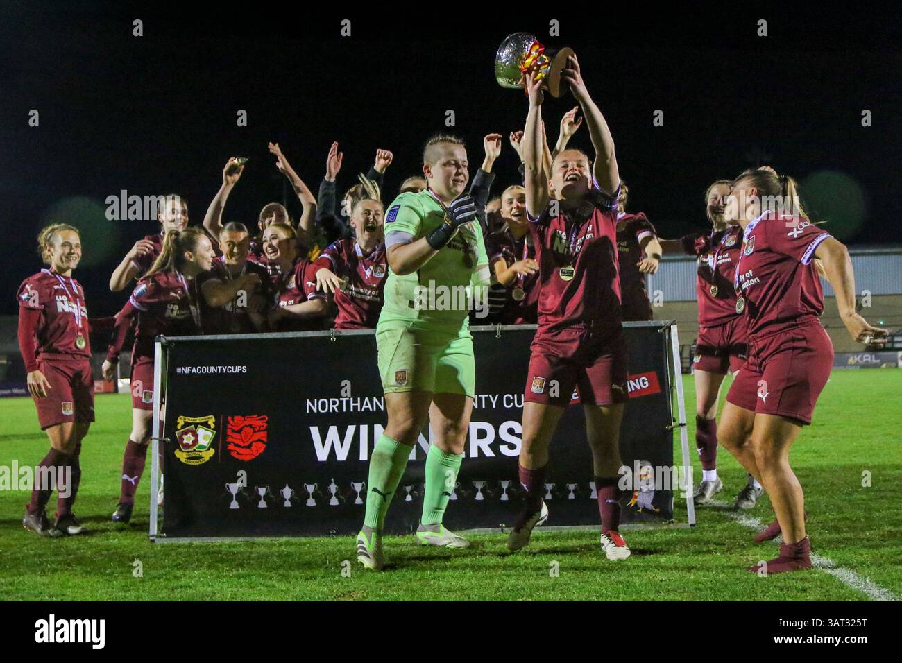 Corby, UK. Northampton Town's Zoe Boote lifts the Northampton FA Womens ...