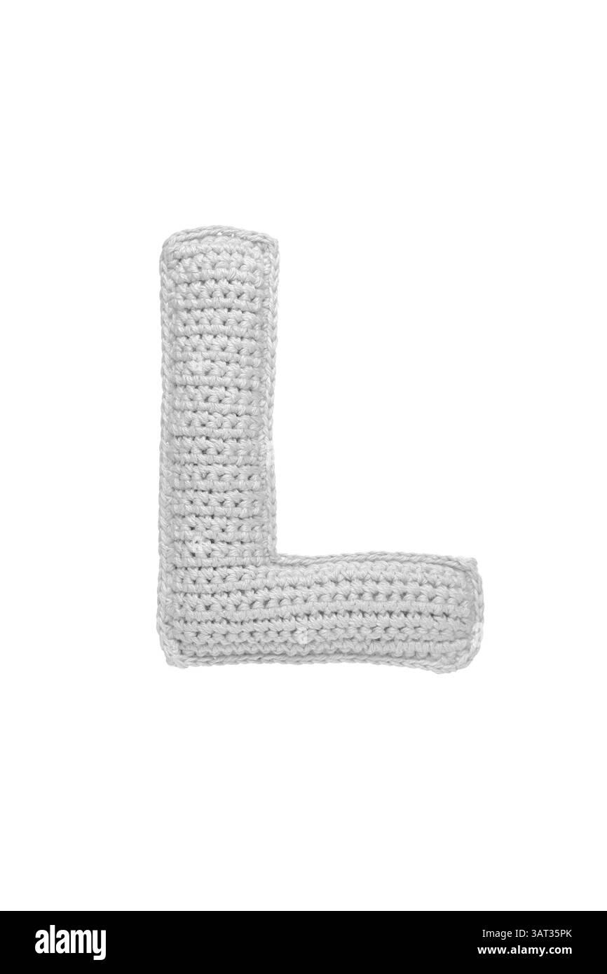 Handmade crocheted letter L in light grey yarn, isolated on white ...
