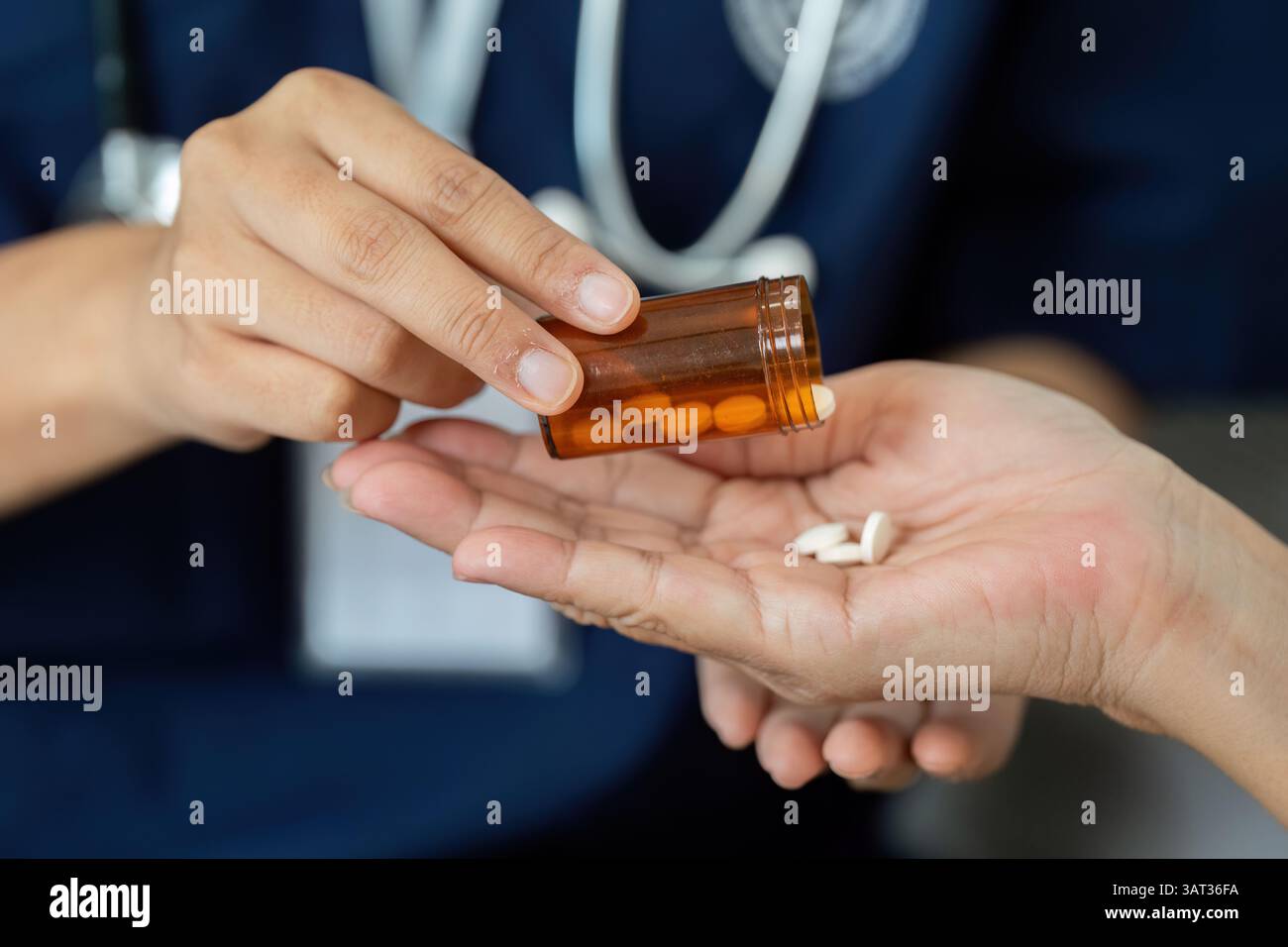Medication Management and Patient Care. A caregiver carefully ...
