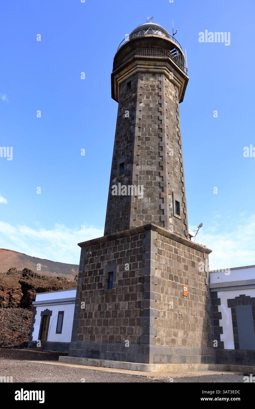 El Faro de Punta Orchilla lighthouse with red volcanic scenery, El ...