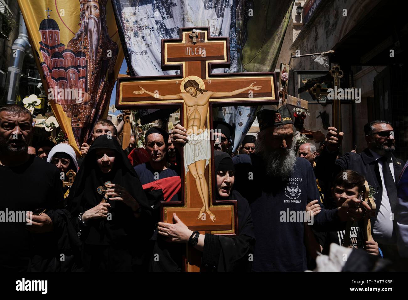 Christian pilgrims carry crosses during Good Friday procession in the ...