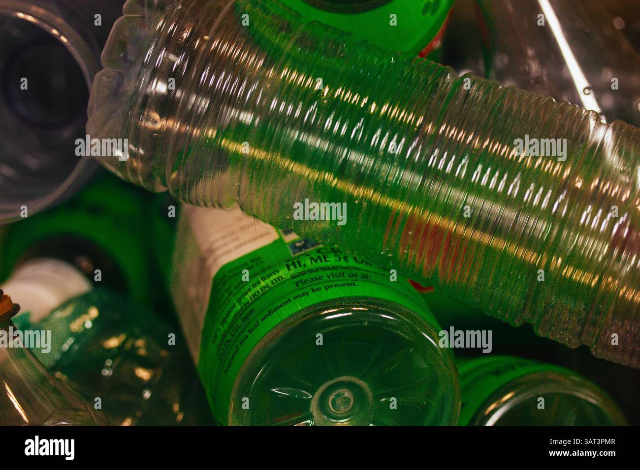 A collection of discarded plastic bottles, highlighting the textures ...