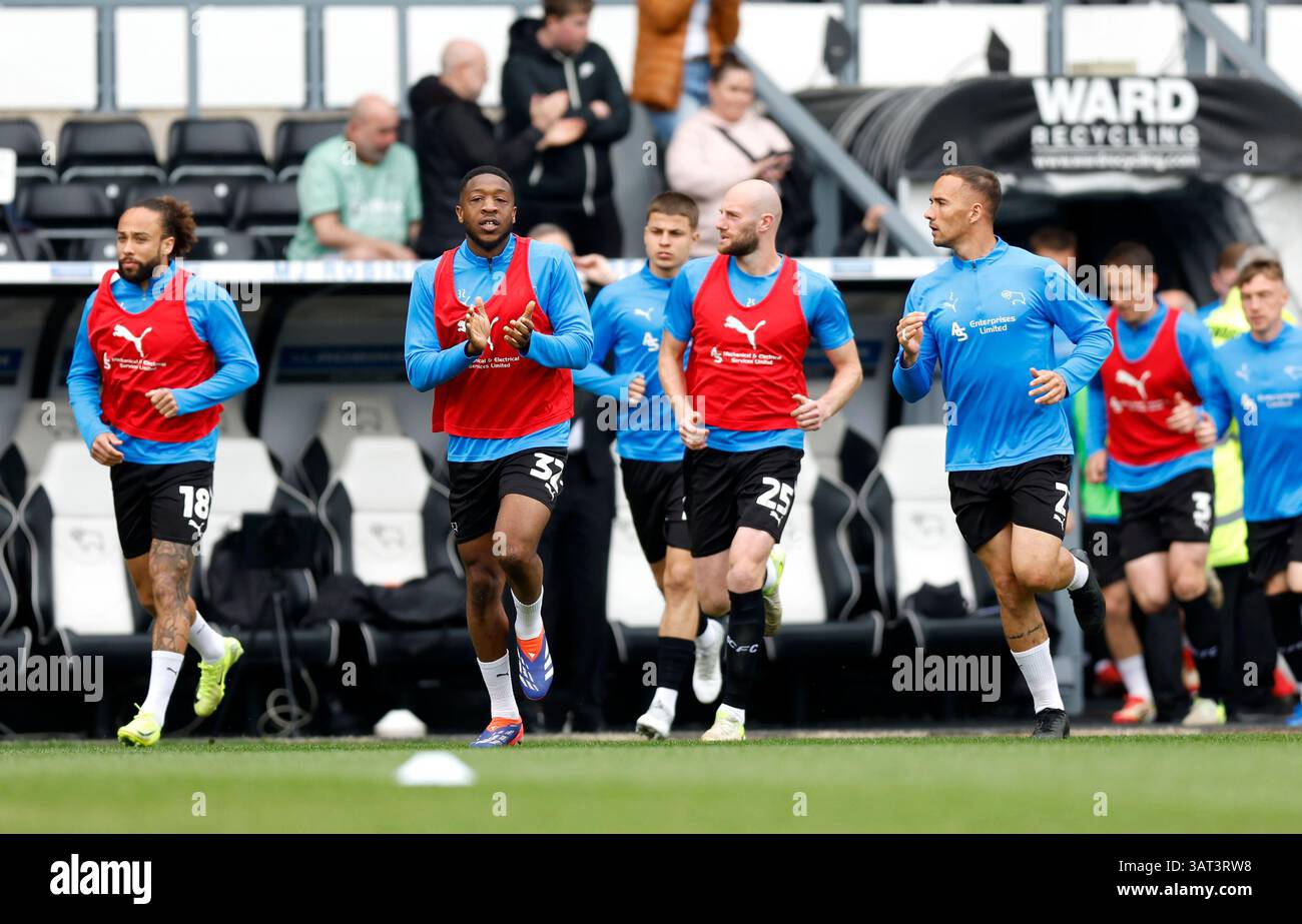 Derby County's Marcus Harness (left), Ebou Adams, Matt Clarke and Kane ...